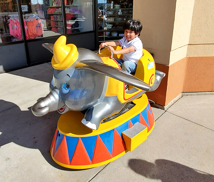 Kiddie rides offer blessed moments of distraction for young shoppers, buying parents precious additional minutes in nearby stores.