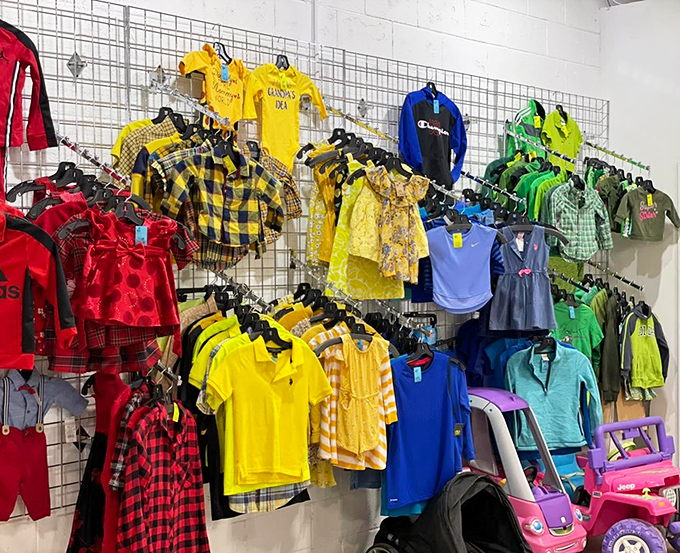 The rainbow wall of childhood&mdash;where tiny fashionistas can build wardrobes that grow faster than their occupants.