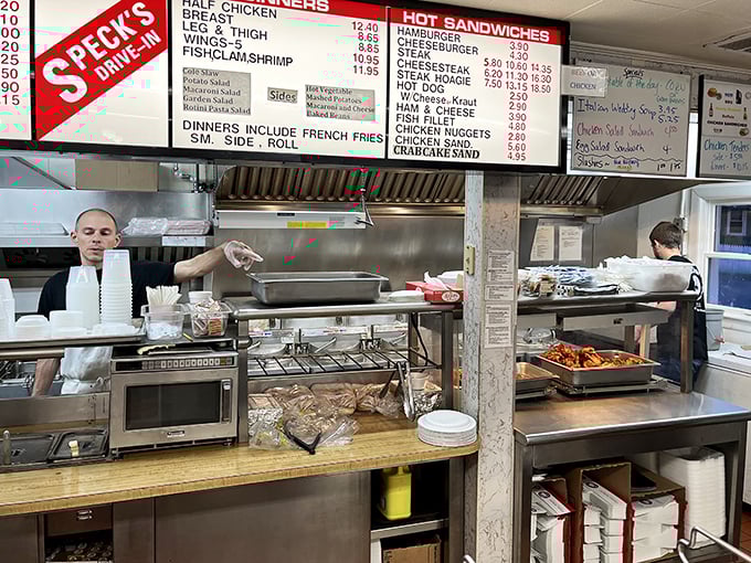 Behind the scenes where the magic happens. No fancy equipment, just well-practiced hands creating consistent deliciousness.