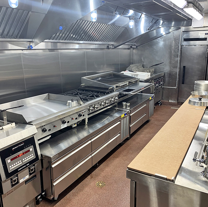 The gleaming kitchen &ndash; a stainless steel symphony where Reuben dreams are born and burger wishes come true.