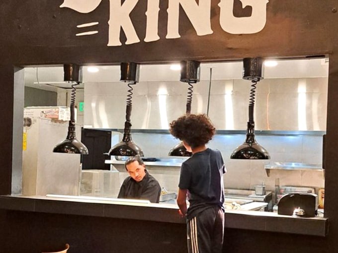 Under "Brisket is King," the kitchen operates with the precision of a Swiss watch and the soul of a Southern smokehouse.