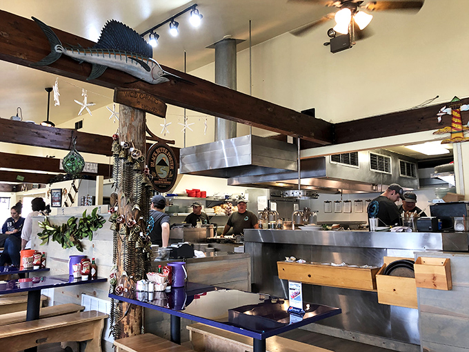 The open kitchen isn't about theatrics&mdash;it's honest cooking with nowhere to hide, exactly as seafood should be prepared.