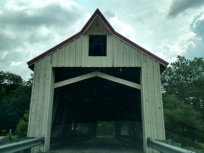 Clouds gather dramatically above the Mechanicsville Bridge, the weather adding another chapter to the structure's century-and-a-half story. 