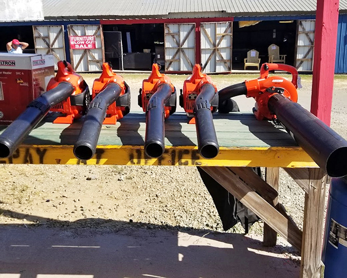 Industrial-strength leaf blowers lined up like soldiers, ready to battle Georgia's endless supply of falling leaves and pine straw.