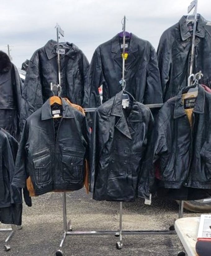 Leather jackets hanging like a scene from a biker's dream. Each one whispering promises of open roads and instant coolness.