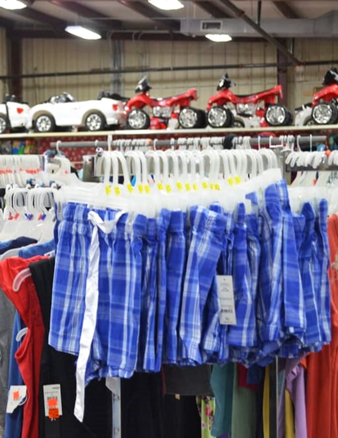 The clothing section—where patriotic blues and reds hang in orderly rows, waiting to clothe the next generation of bargain hunters.