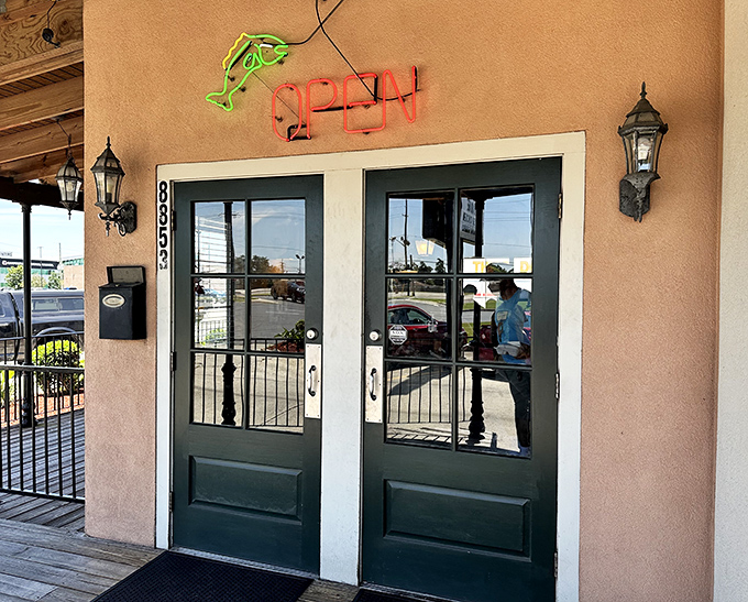 These doors don't just lead to a restaurant&mdash;they're portals to flavor country. The neon fish signals you've found the right place.