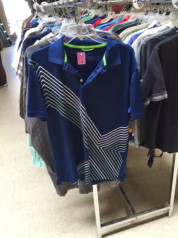 That blue polo with its geometric design screams "weekend casual with personality." Someone's style upgrade is hanging right here.