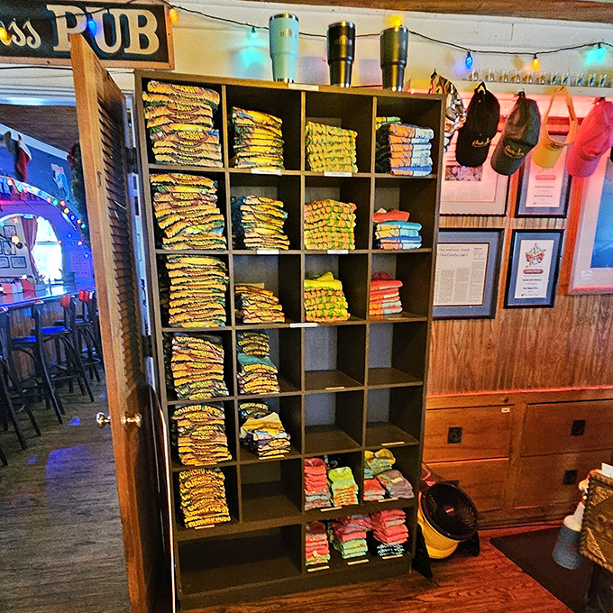The t-shirt wall at Conchy Joe's – where vacation memories come with sleeves. Proof that the best souvenirs are the ones that let you wear your good taste.