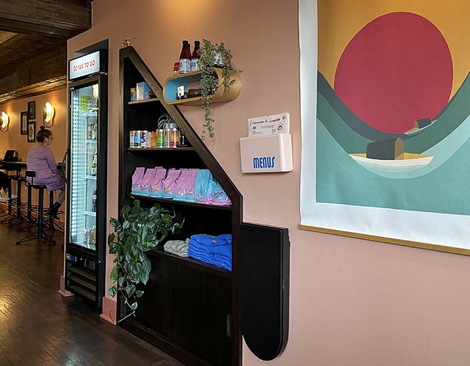 Modern art meets morning fuel station. The shelves of goodies and beverages stand ready for whatever your day demands.