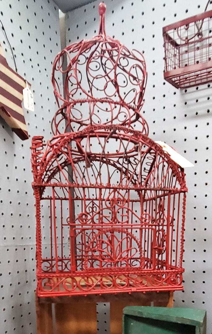This coral-colored birdcage hasn't housed a canary in decades. Now it's ready for its Pinterest-worthy second life in someone's bohemian living room.
