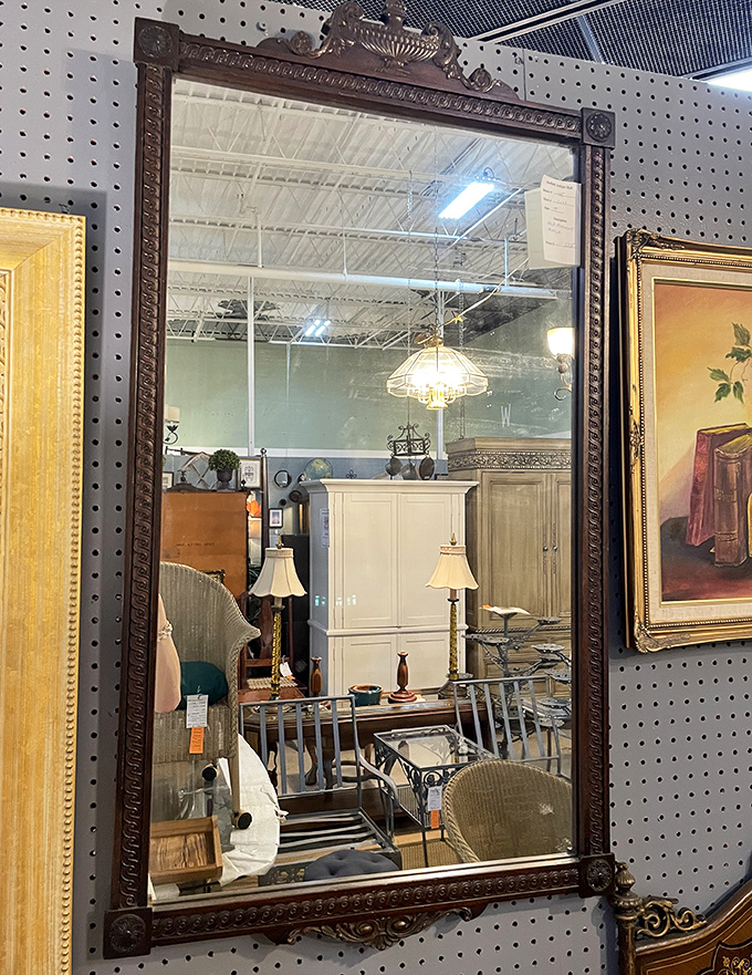 This isn't just a mirror; it's a portal to elegance that would make any room feel like it belongs in Downton Abbey.