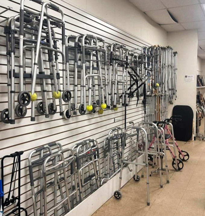 Mobility aids line the wall like a practical sculpture, offering independence and assistance at prices everyone can afford.