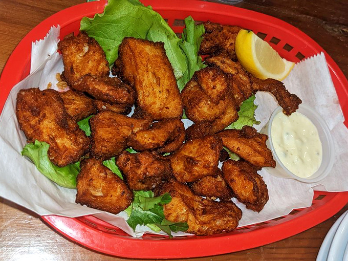 Golden-fried nuggets of fish that crunch like your childhood memories but taste like your adult palate's wildest dreams.