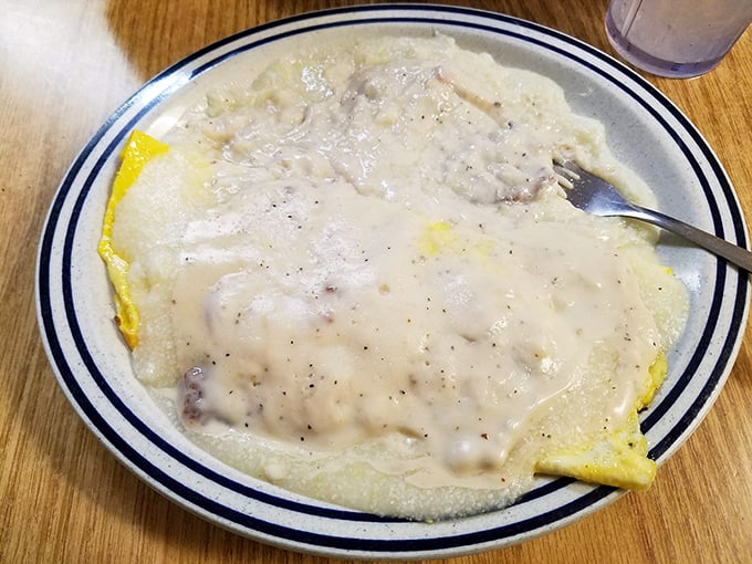 Fluffy omelet blanketed in creamy sausage gravy. When breakfast can't decide what to wear, it puts on everything&mdash;and looks fabulous.