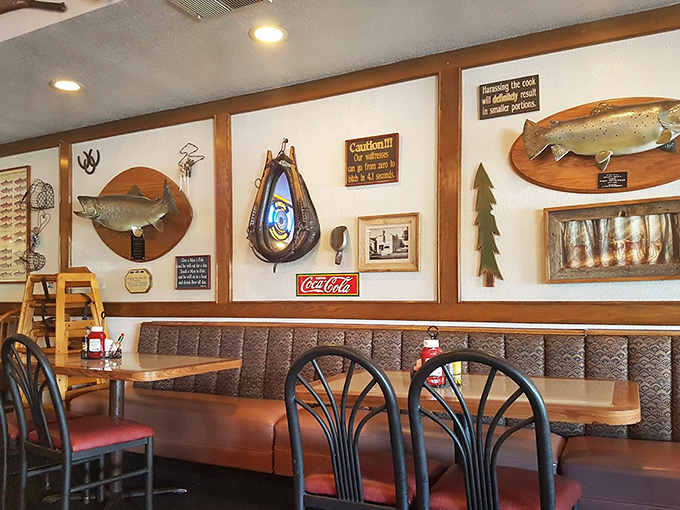 Mounted fish and witty signs create the perfect backdrop for booths that have hosted countless road trip stories, hiking adventures, and local gossip exchanges.