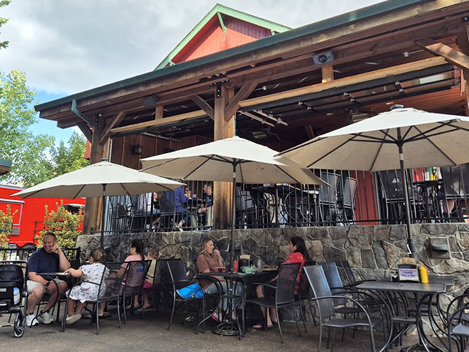 When Oregon weather cooperates, the outdoor patio becomes prime real estate for enjoying those famous burgers under open skies.