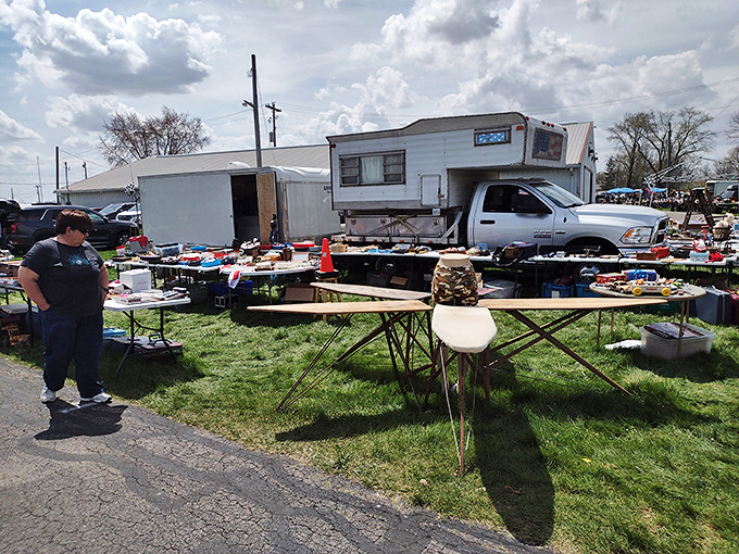 The impromptu marketplace creates its own geography. Vendors arrange their wares with the careful consideration of museum curators, albeit with negotiable price tags. 