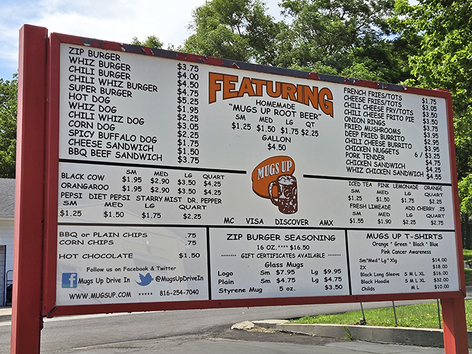 The outdoor menu board stands ready for drive-up decisions &ndash; everything you need to know, nothing you don't.