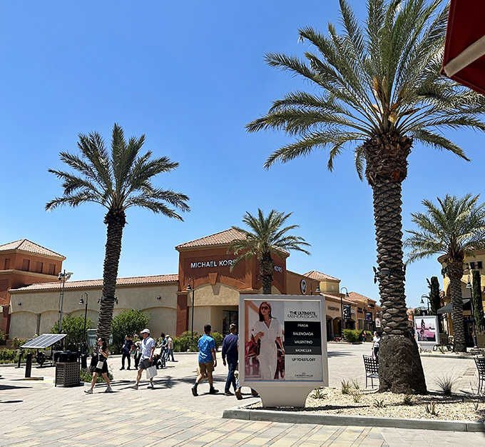 Michael Kors basks in the desert sunshine, surrounded by palm trees. Shopping here feels like a vacation where you bring souvenirs home to yourself.