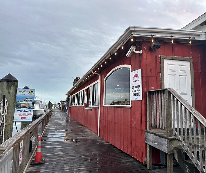 The red boardwalk building beckons like a maritime mirage&mdash;promising cold beer inside and seafood treasures that would make Captain Ahab forget all about that whale.
