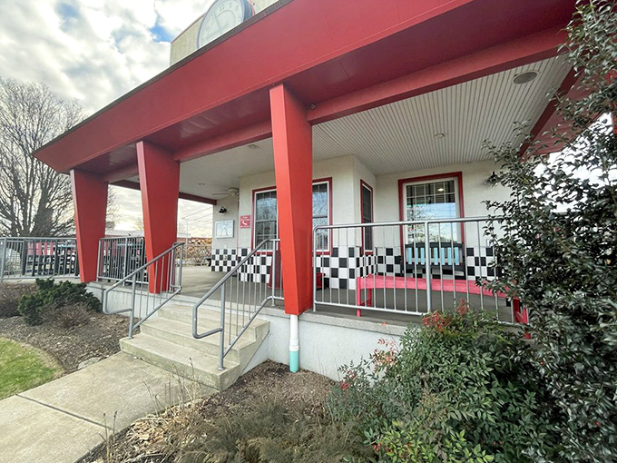 The entrance promises retro delights within. Those black and white checkerboard accents are the diner equivalent of a secret handshake.