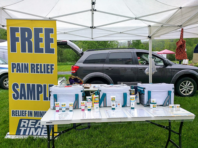 Even at a flea market, someone's selling pain relief! Vermont pragmatism on display&mdash;because treasure hunting can be hard on the knees.