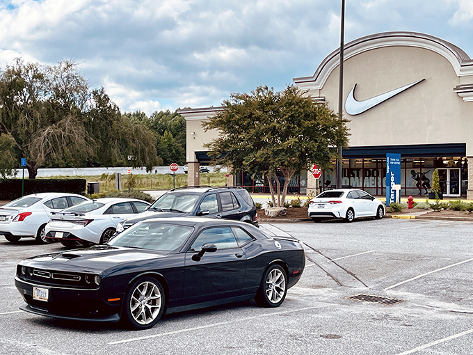 The Nike store stands ready for athletic aspirations, where even parking nearby feels like the warm-up to your shopping workout.