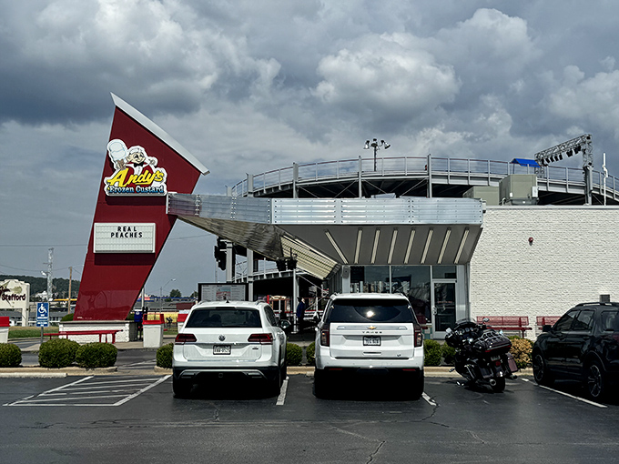 Red benches await happy customers, providing front-row seats to Branson's bustling energy and the perfect stage for people-watching between bites.
