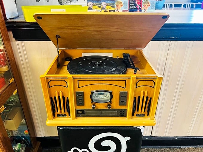 This sunny yellow record player doesn't just play vinyl&mdash;it's a time machine that transports you back to Sunday afternoons at Grandma's.