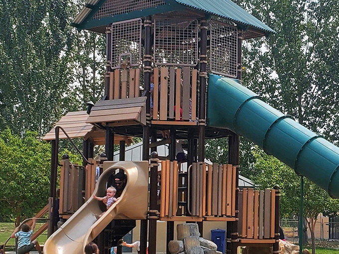 The playground where parents make deals with children: "Ten more minutes at the vegetable stands equals ten minutes on the slide."