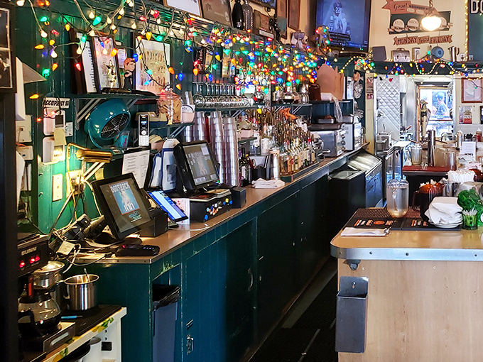 The register area, festooned with colorful lights year-round, feels like a celebration of food that happens to accept payment.