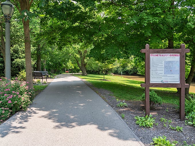 Jasper's Riverwalk offers shaded serenity just steps from downtown, where benches invite you to sit and remember what peace sounds like.