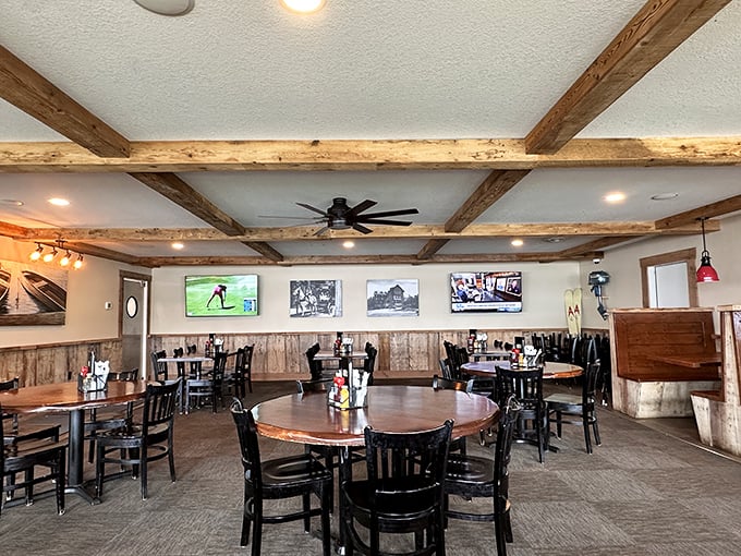 Round tables await hungry diners beneath exposed wooden beams and strategically placed TVs for those who can't miss the game.