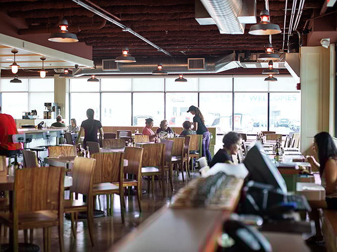 The dining room buzzes with the energy of locals and visitors united by one common language: appreciation for authentic Hawaiian food.