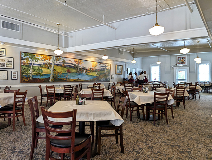 White tablecloths and wooden chairs tell you this place takes food seriously, but the atmosphere says "relax, you're family now."