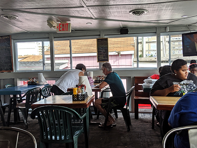 A dining room where conversations flow as easily as the drinks. These tables have heard decades of laughter, celebrations, and the occasional "mmm" of seafood satisfaction. 