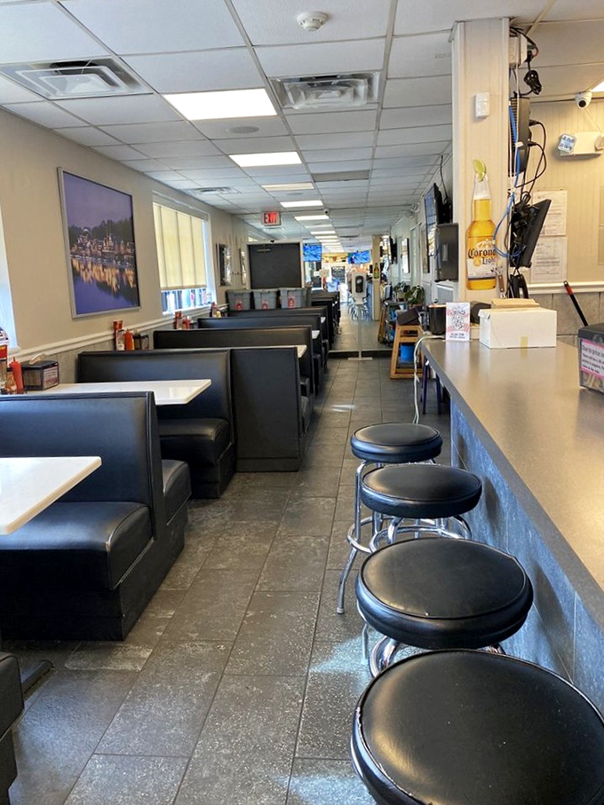 Classic diner-style booths where countless Philly sports debates have been settled over the last bite of a cheesesteak.