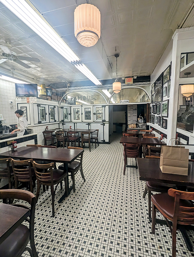 The dining room's vintage charm comes from decades of conversations had, deals made, and sandwiches conquered by Philadelphians from all walks of life.