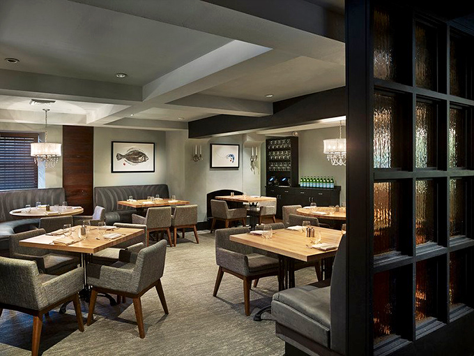 The dining room whispers "special occasion" without shouting it&mdash;elegant restraint with comfortable seating that encourages lingering over every course.