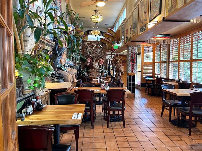 A dining room where every corner tells a story, and the plants have clearly been thriving on good conversation for years.