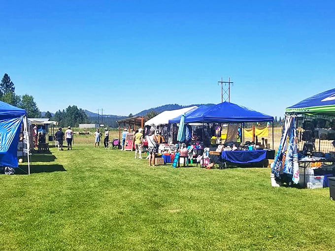 The universal dance of flea market browsing&mdash;meandering between tents with the focused determination of hunters on a mission.