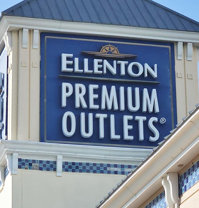 The iconic blue sign that signals to shoppers they've reached the promised land of retail therapy and wallet-friendly designer finds.