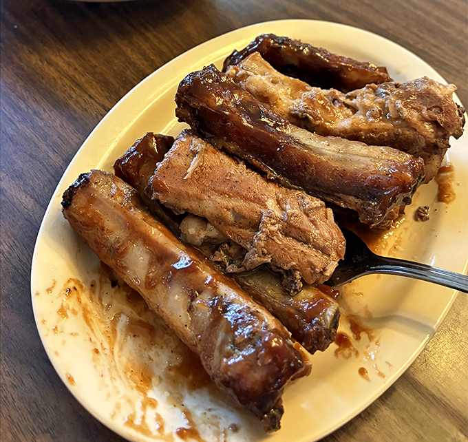 Saturday's BBQ ribs glisten with sauce and promise fall-off-the-bone tenderness. These aren't just ribs&mdash;they're edible proof that patience is a virtue.