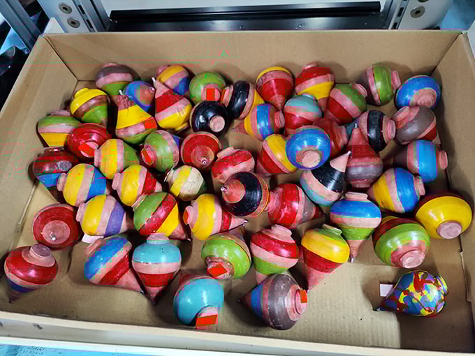 Wooden spinning tops in a kaleidoscope of colors&mdash;simple joys that have entertained generations before smartphones stole the show.