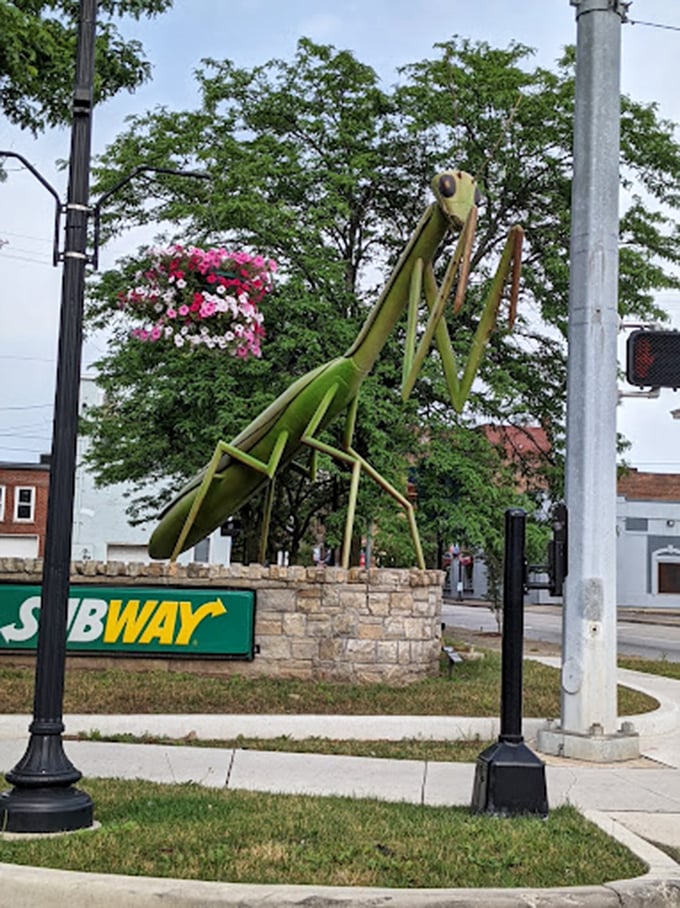 Spring brings fresh blooms to downtown Kokomo, complementing the ever-present green of the town's favorite insect resident.