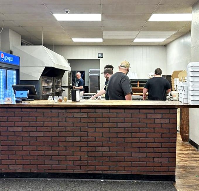 Behind every great pizza is a dedicated team, working with the practiced precision that comes only from making thousands of perfect pies.