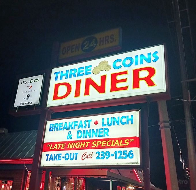The iconic Three Coins sign stands as a beacon of hope for the hungry, promising salvation in the form of perfectly cooked eggs and bottomless coffee.
