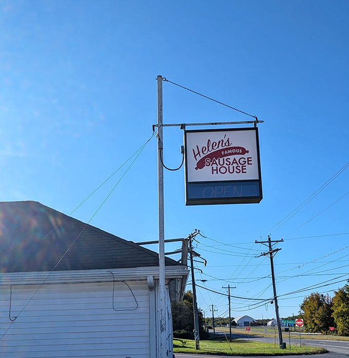 The roadside sign swings gently in the Delaware breeze, a North Star for breakfast pilgrims seeking sausage salvation along Route 13.