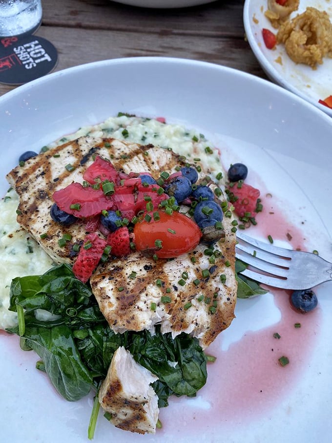 Swordfish that doesn't need to flex&mdash;perfectly grilled and accessorized with summer berries like it's headed to a fancy ocean gala.